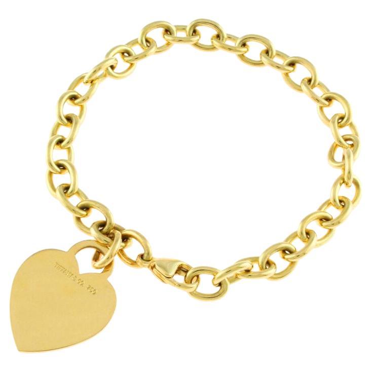 TIFFANY and Co. 18K Gold Heart Tag Charm Bracelet 7.5" For Sale at 1stDibs