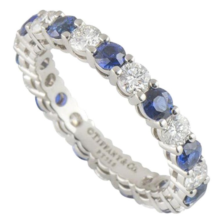 Tiffany and Co. Diamond and Sapphire Platinum Embrace Eternity Ring at 1stDibs