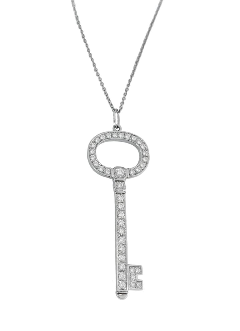 Tiffany and Co. Diamond Platinum Oval Key Pendant For Sale at 1stDibs