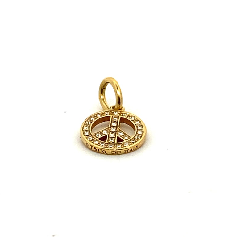 Tiffany and Co. Diamond Yellow Gold Metro Peace Charm Pendant For Sale ...