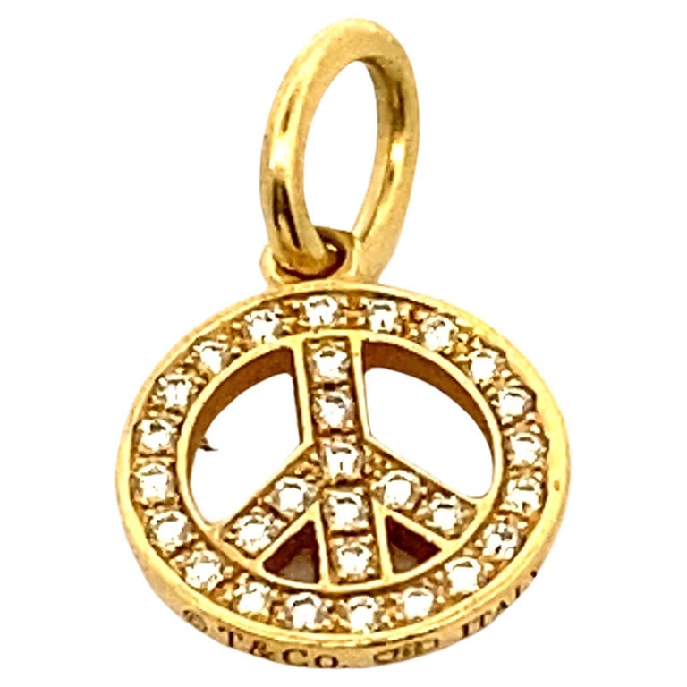 Tiffany and Co. Diamond Yellow Gold Metro Peace Charm Pendant For Sale ...