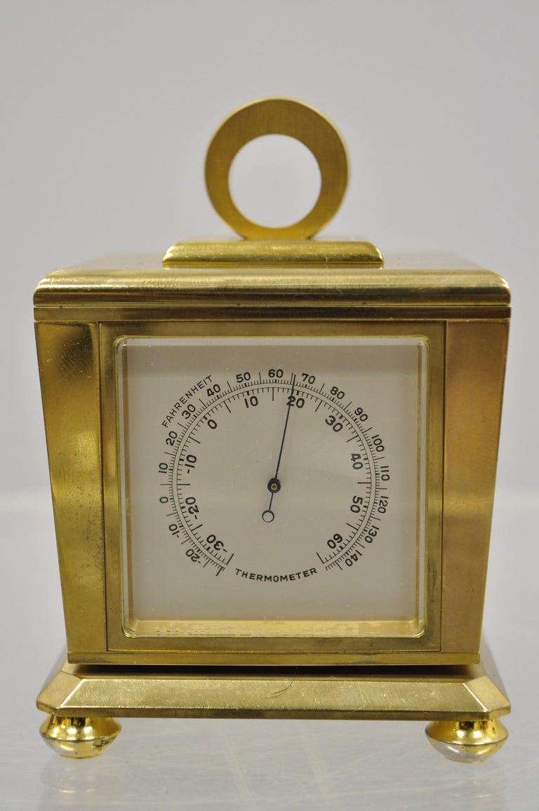 Tiffany and Co. Eight Day Brass Four Caster Revolving Small Desk Clock ...