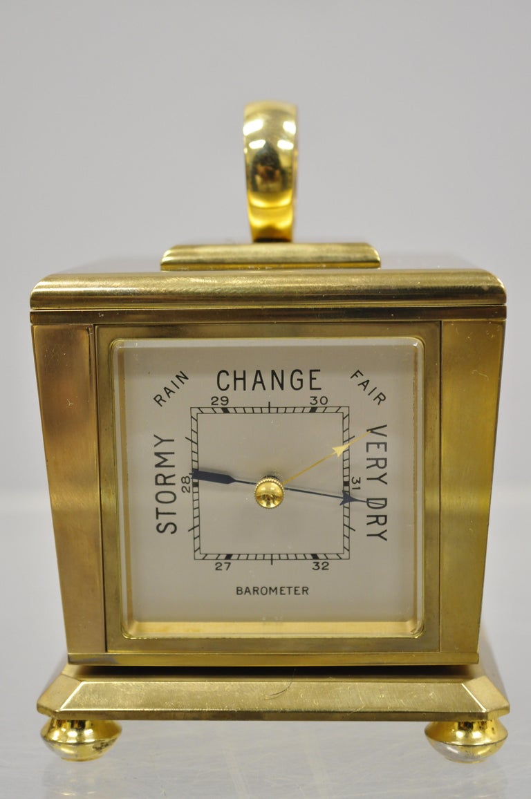 Tiffany and Co. Eight Day Brass Four Caster Revolving Small Desk Clock ...
