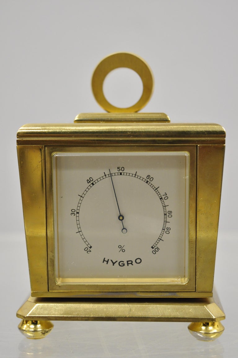 Tiffany and Co. Eight Day Brass Four Caster Revolving Small Desk Clock ...