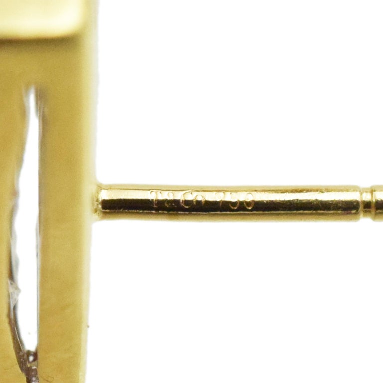Tiffany and Co. Invisible Set Diamond Earrings For Sale at 1stDibs