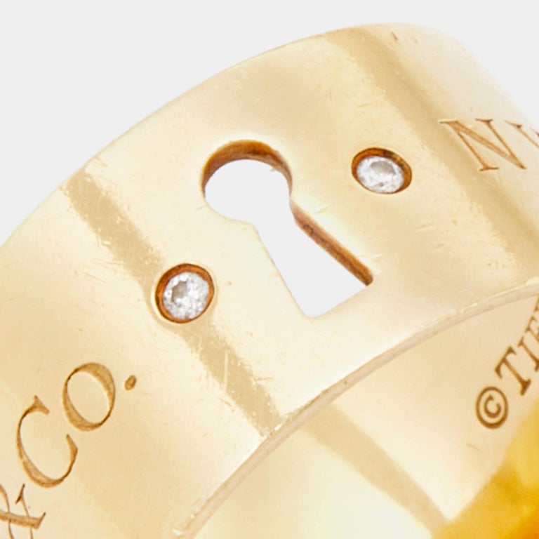 Tiffany and Co. Keyhole Diamond 18k Yellow Gold Wide Band Ring Size 50 For Sale at 1stDibs