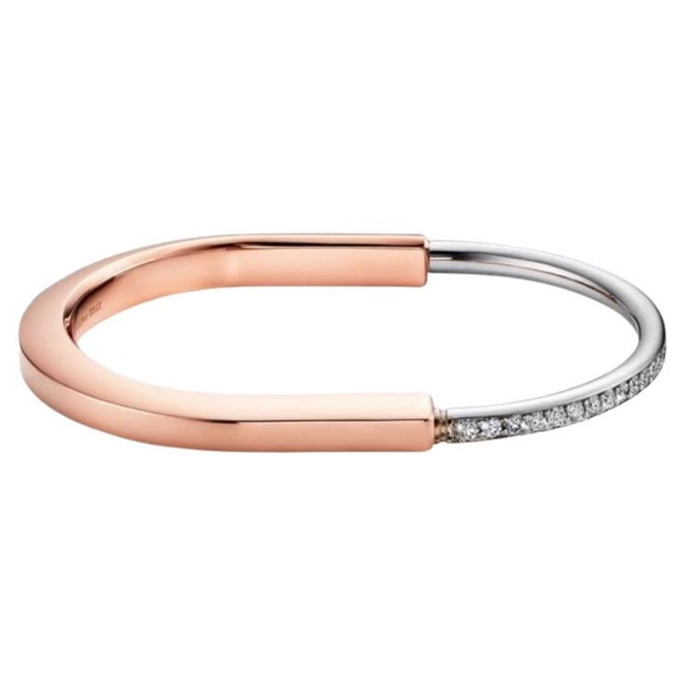 Tiffany and Co. Lock Bangle in 18K Rose and White Gold with Half Pavé ...