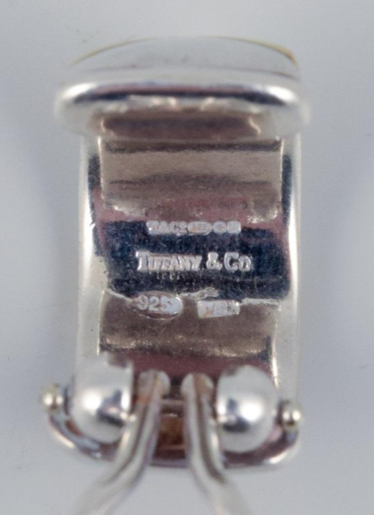 Tiffany and Co. Pair of ear clips. Partially gilded silver. 1960/70s ...