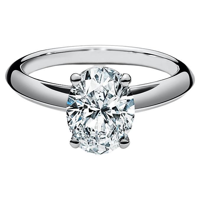 Tiffany and Co. Oval Cut Diamond Platinum Solitaire Ring For Sale at ...