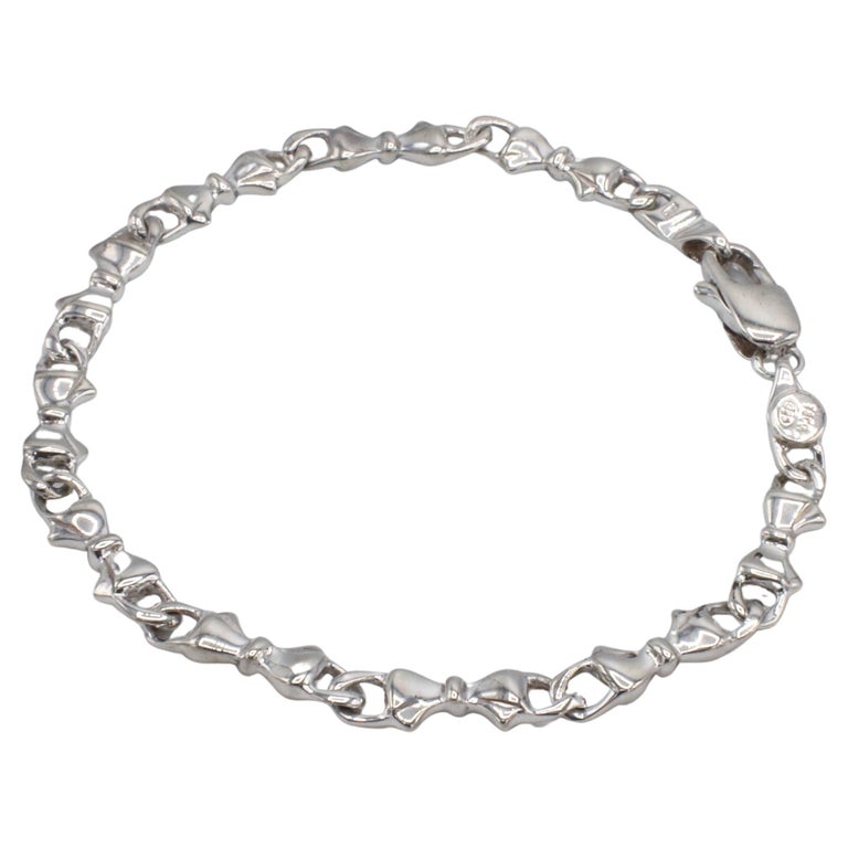 Tiffany and Co. Sterling Silver Bow Link Bracelet For Sale at 1stDibs
