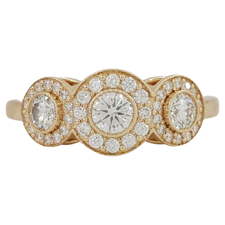 Tiffany and Co. Three-Stone Round Brilliant Diamond Halo Engagement ...