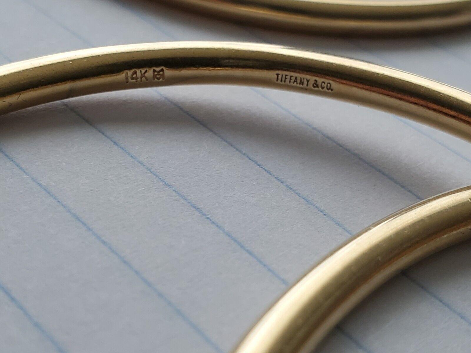 TIFFANY and CO. Trio of Retro 14k Yellow Gold Bangle Bracelets Circa 1950s For Sale at 1stDibs