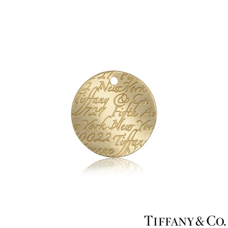 Tiffany and Co. Yellow Gold Round Notes Pendant For Sale at 1stDibs