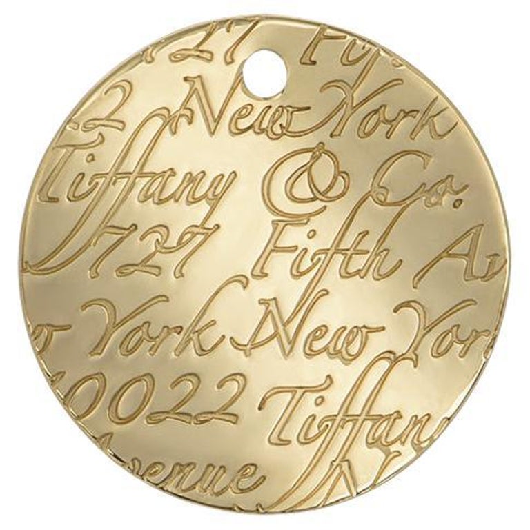 Tiffany and Co. Yellow Gold Round Notes Pendant For Sale at 1stDibs