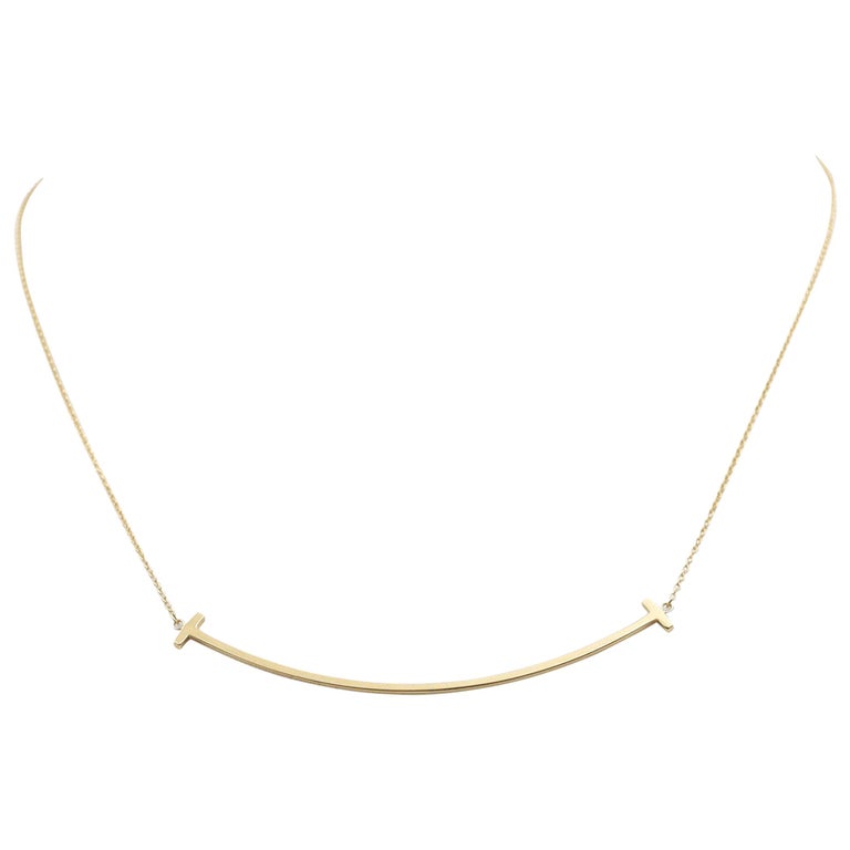 Tiffany and Co. Yellow Gold Smile Pendant Necklace at 1stDibs