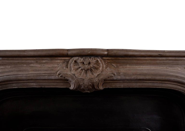 Transitional French Louis XIV / XV Limestone Fireplace at 1stDibs