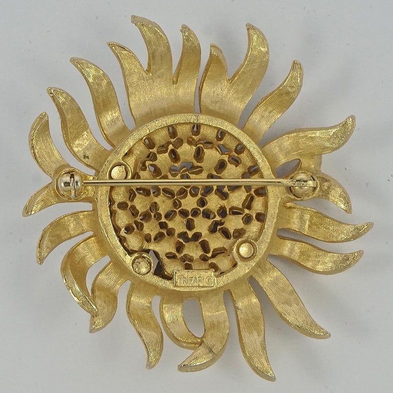 Trifari Articulated Textured Gold Plated and Blue Rhinestone Flower ...