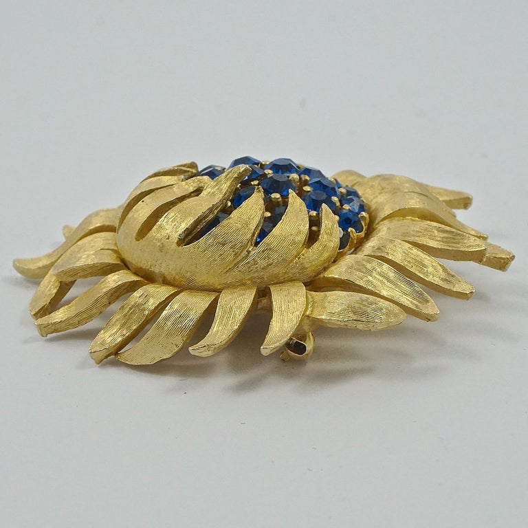Trifari Articulated Textured Gold Plated and Blue Rhinestone Flower ...