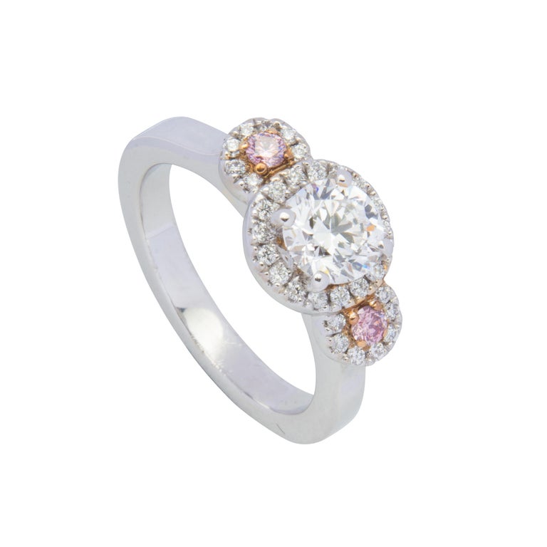 18 Karat White and Rose Gold Trilogy White and Pink Diamond Three-Stone ...