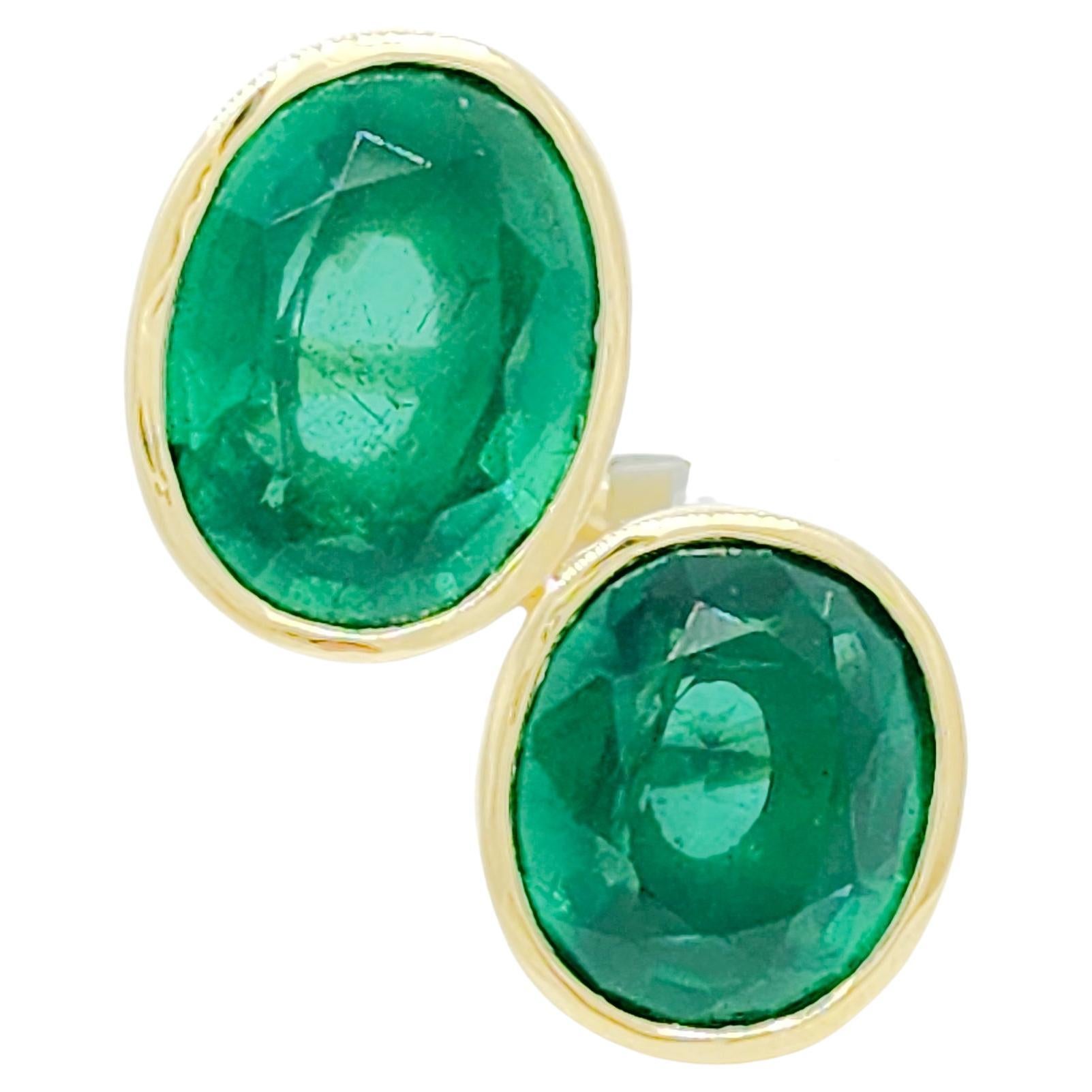 Two Emerald Oval Bypass Ring in 18k Yellow Gold For Sale at 1stDibs
