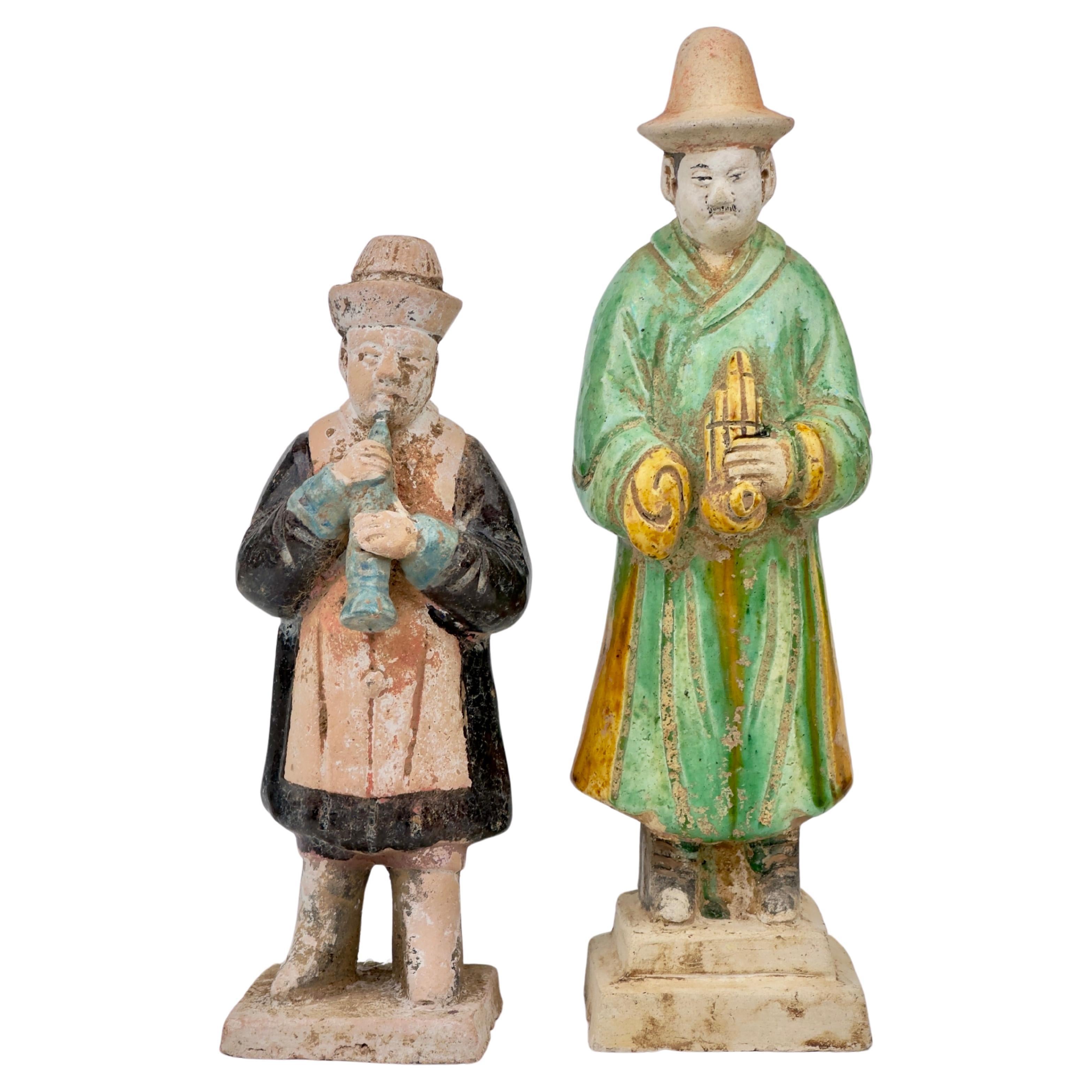 Two glazed figures playing the instrument, Ming Period (1368-1644) For ...