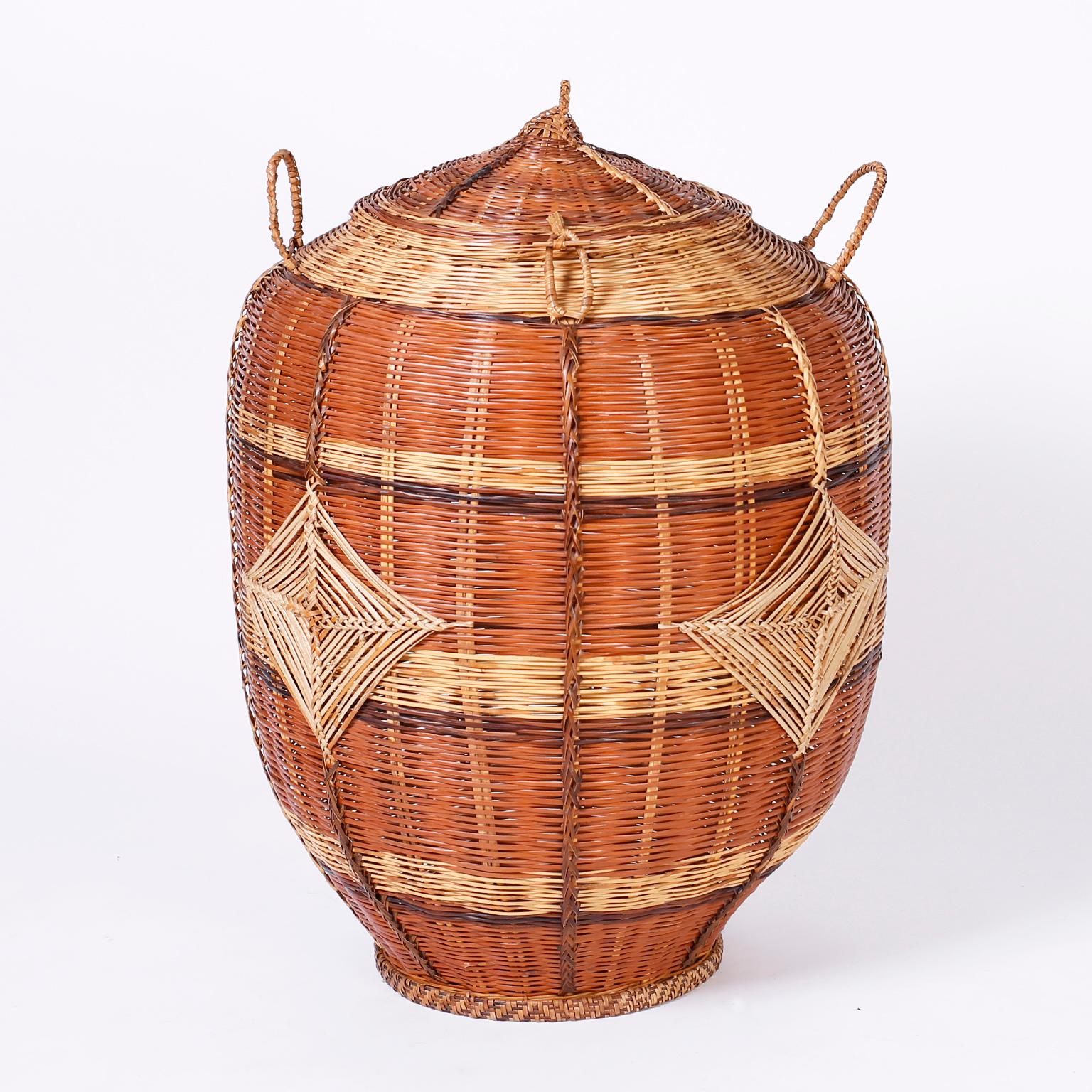 Two Lidded Woven Reed Baskets at 1stDibs