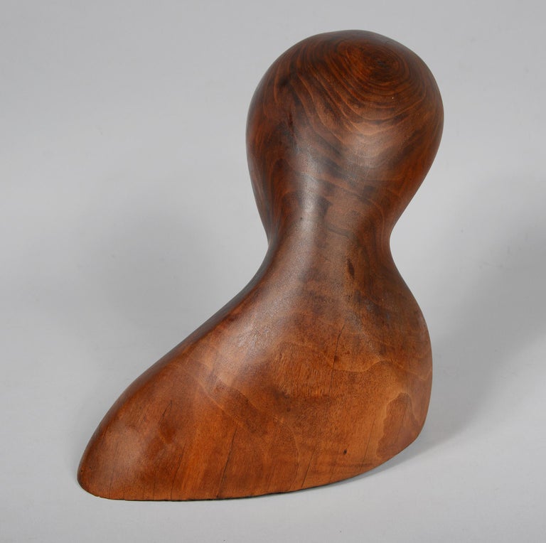 Two Modernist Figurative Carved Wood Bust Sculptures at 1stDibs