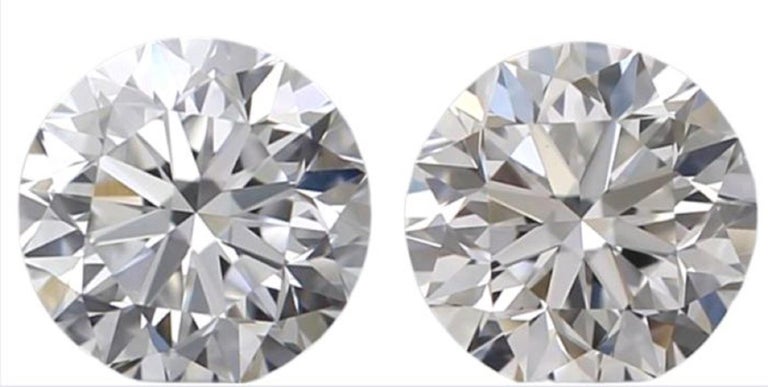 Deux diamants ronds et brillants naturels de 0,80 carat, certifis G VS1 ...