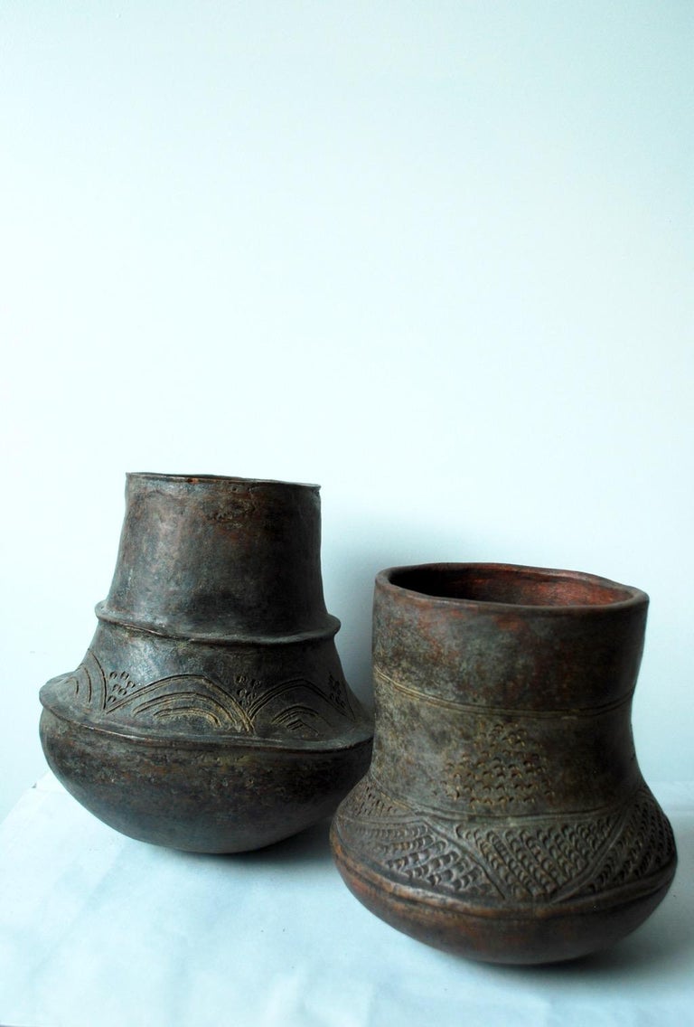 Two Pieces of a Pair of Early 20th Century Etched African Vessels from ...