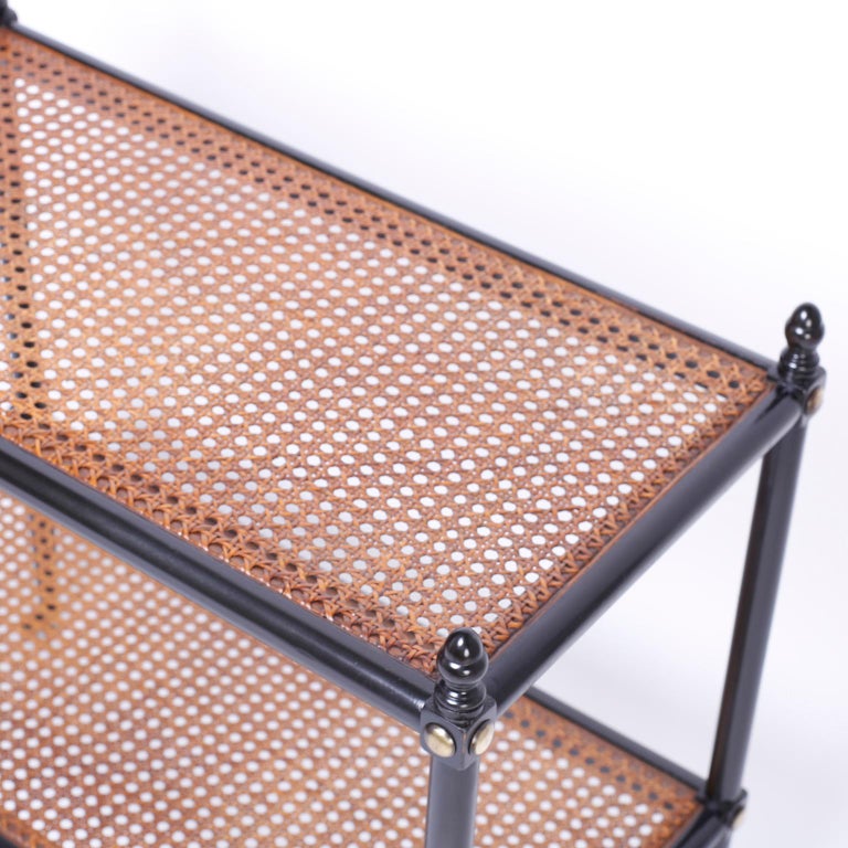 Two Tiered Caned Table at 1stDibs