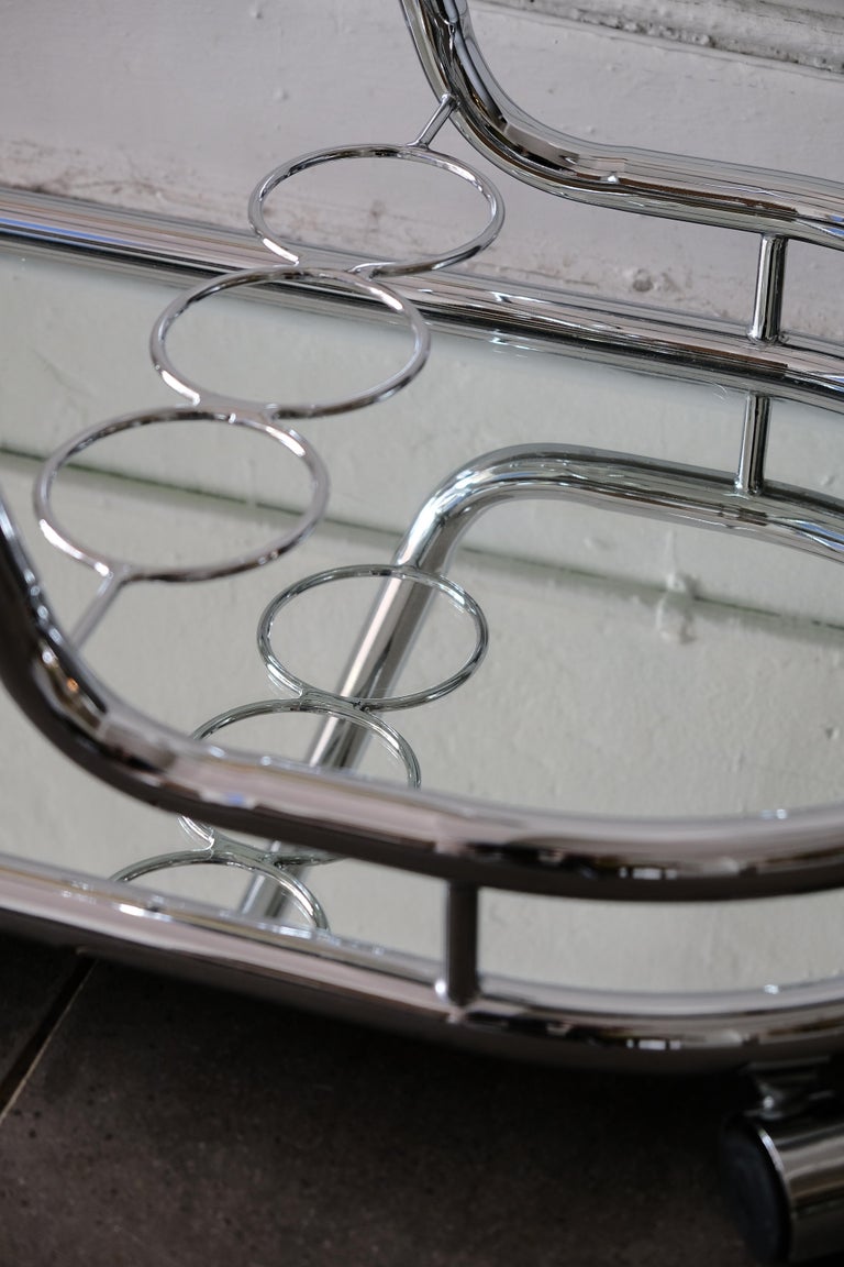 Two-Tiered Tubular Chrome Mirror and Glass Bar Cart at 1stDibs