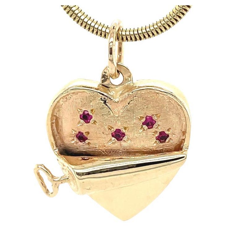 Unique Gold and Ruby Heart Charm For Sale at 1stDibs