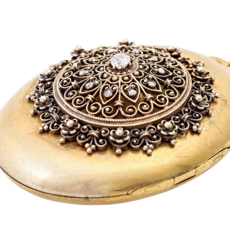 Unique medallion pendant from around 1870, set with 1 old European cut ...