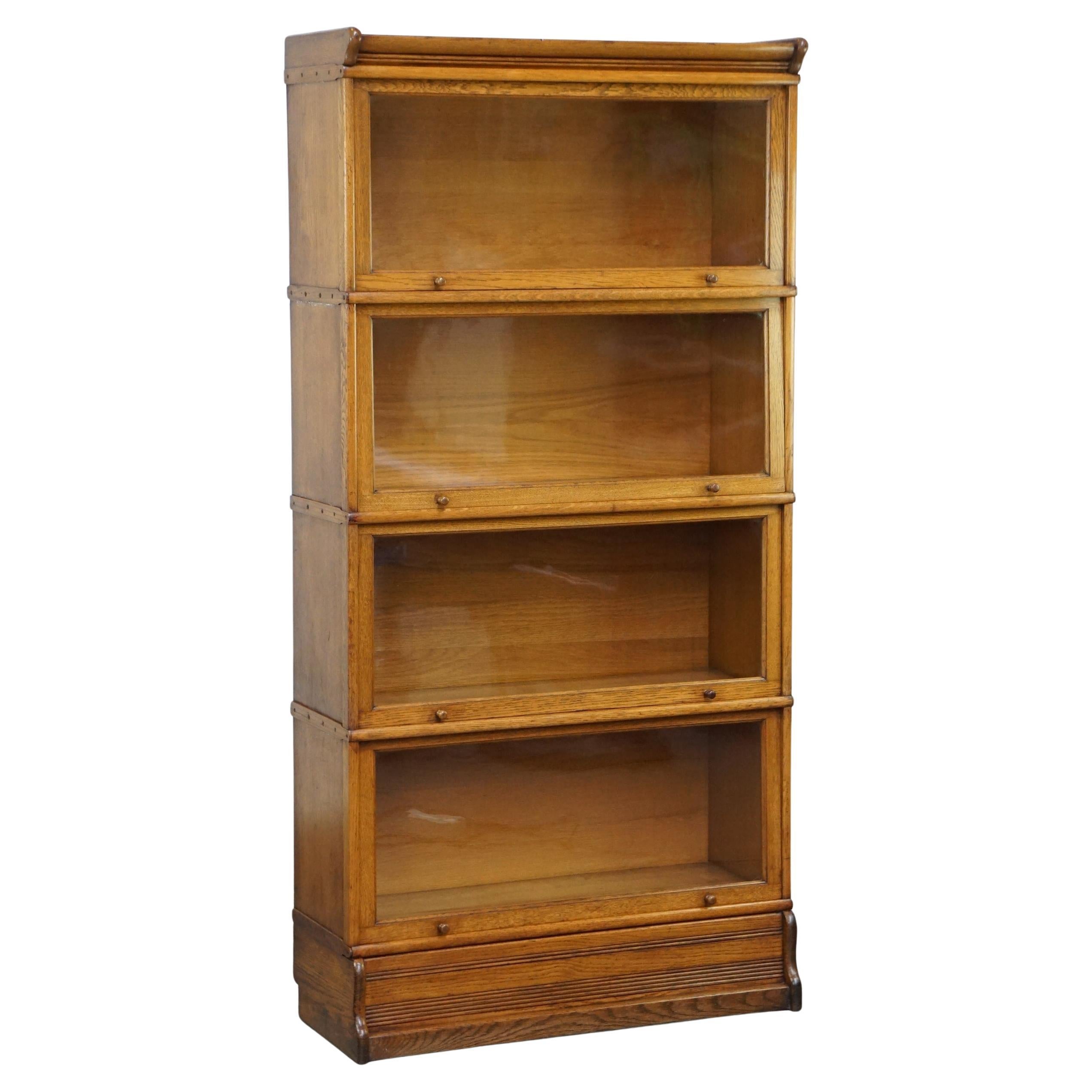 Unique, stately, modular antique oak English bookcase For Sale at 1stDibs