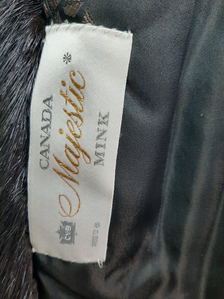Unused majestic mink fur coat with a hood size 8-10 For Sale at 1stDibs