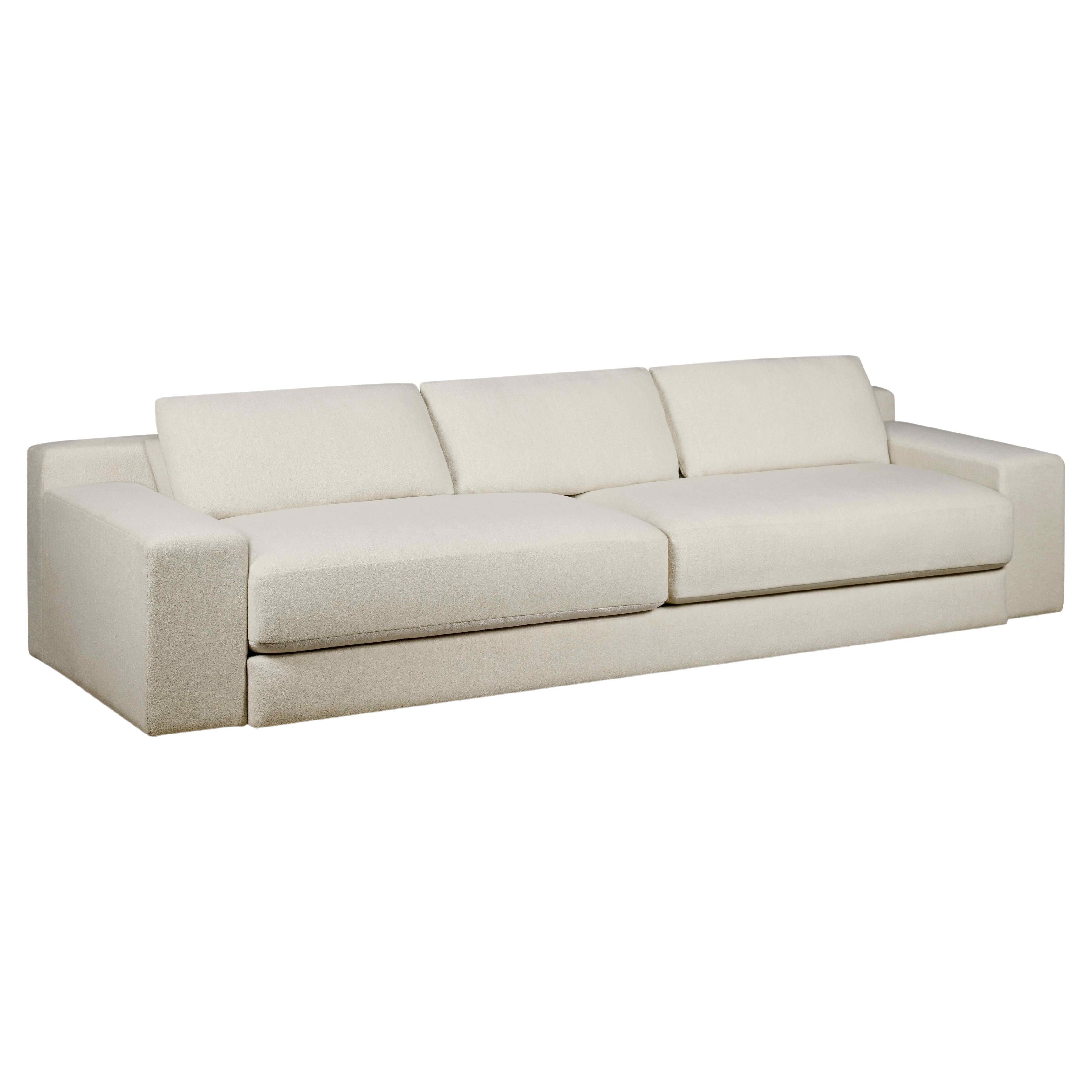 Upholstered Chianni Sofa with solid wood base and straight lines ...
