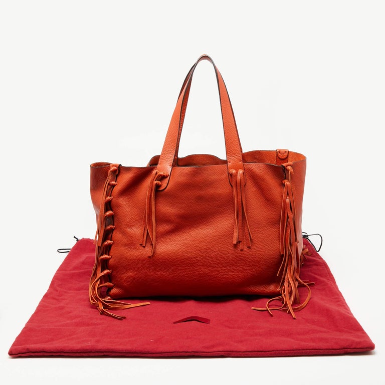 Valentino Orange Pebbled Leather Fringe C-Rockee Tote For Sale at 1stDibs