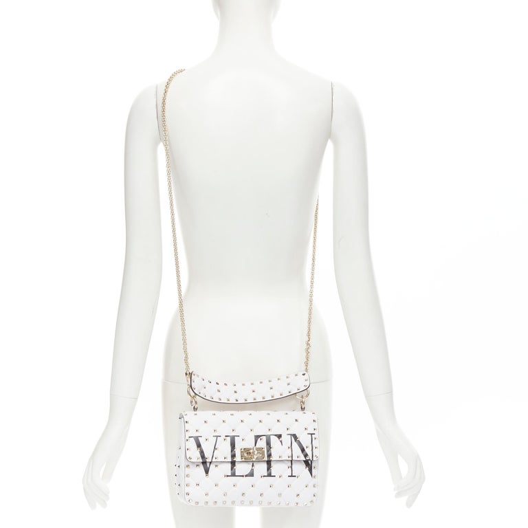 VALENTINO VLTN Rockstud Spike white gold studded turnlock crossbody ...