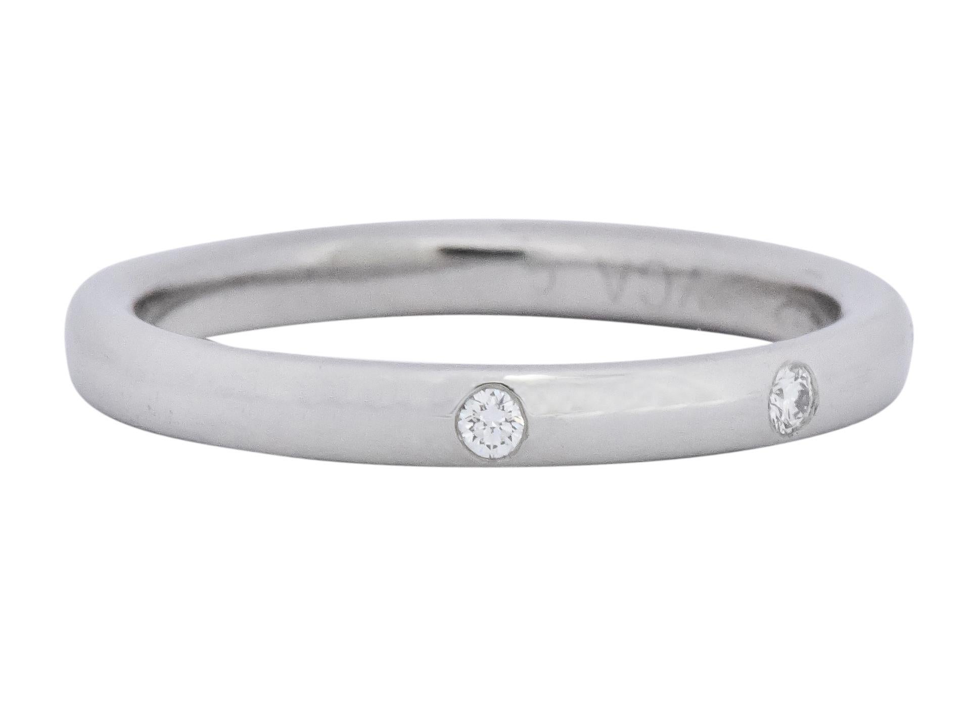 Van Cleef and Arpels Diamond Platinum Three-Stone Band Ring at 1stDibs