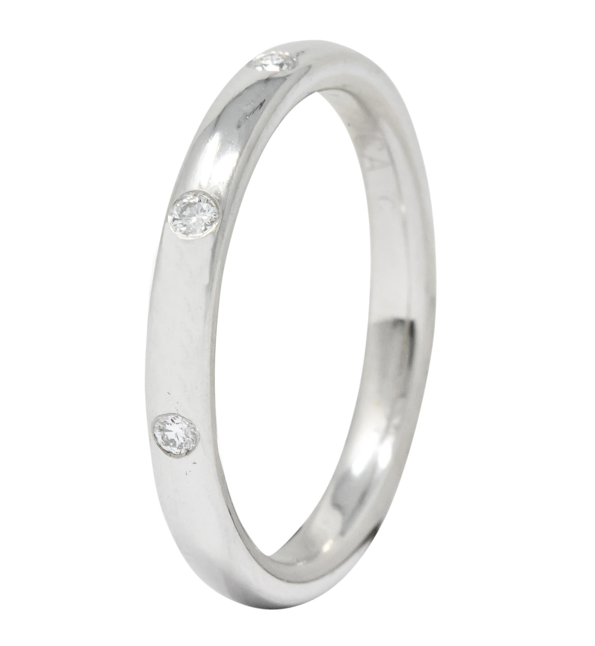 Van Cleef and Arpels Diamond Platinum Three-Stone Band Ring at 1stDibs