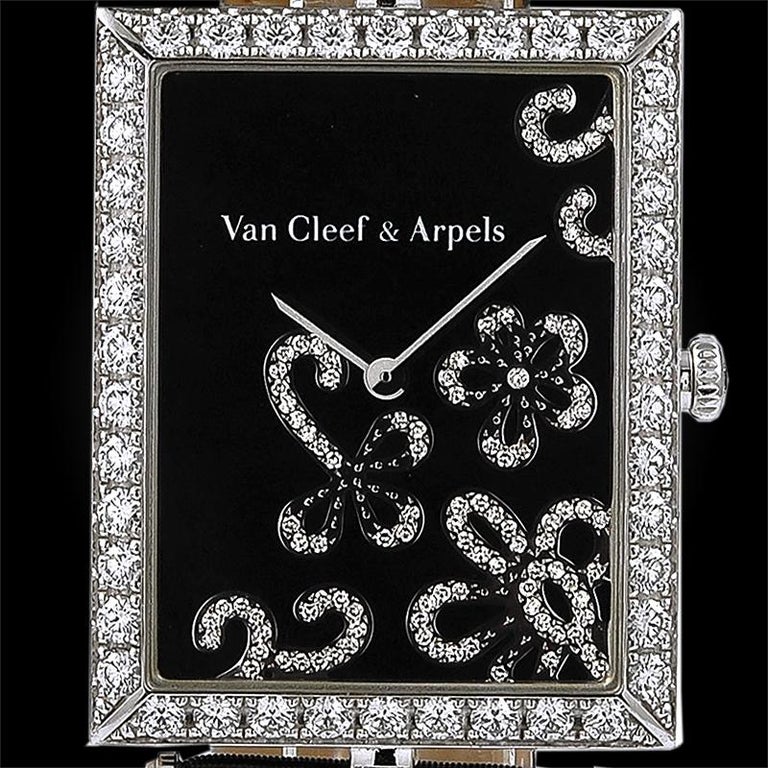 Van Cleef and Arpels Dentelle Diamond Bezel Flower Face Watch at 1stDibs