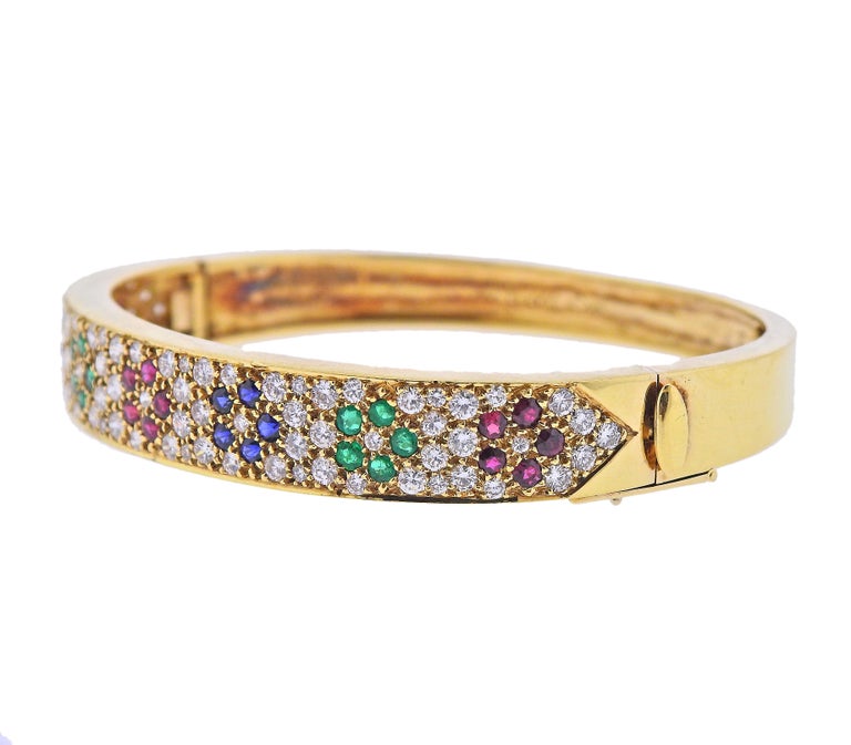 Van Cleef and Arpels Flower Emerald Sapphire Ruby Diamond Gold Bangle ...