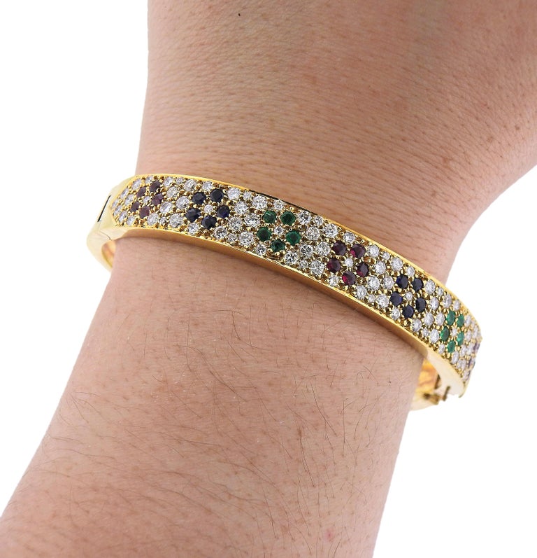 Van Cleef and Arpels Flower Emerald Sapphire Ruby Diamond Gold Bangle Bracelet For Sale at ...