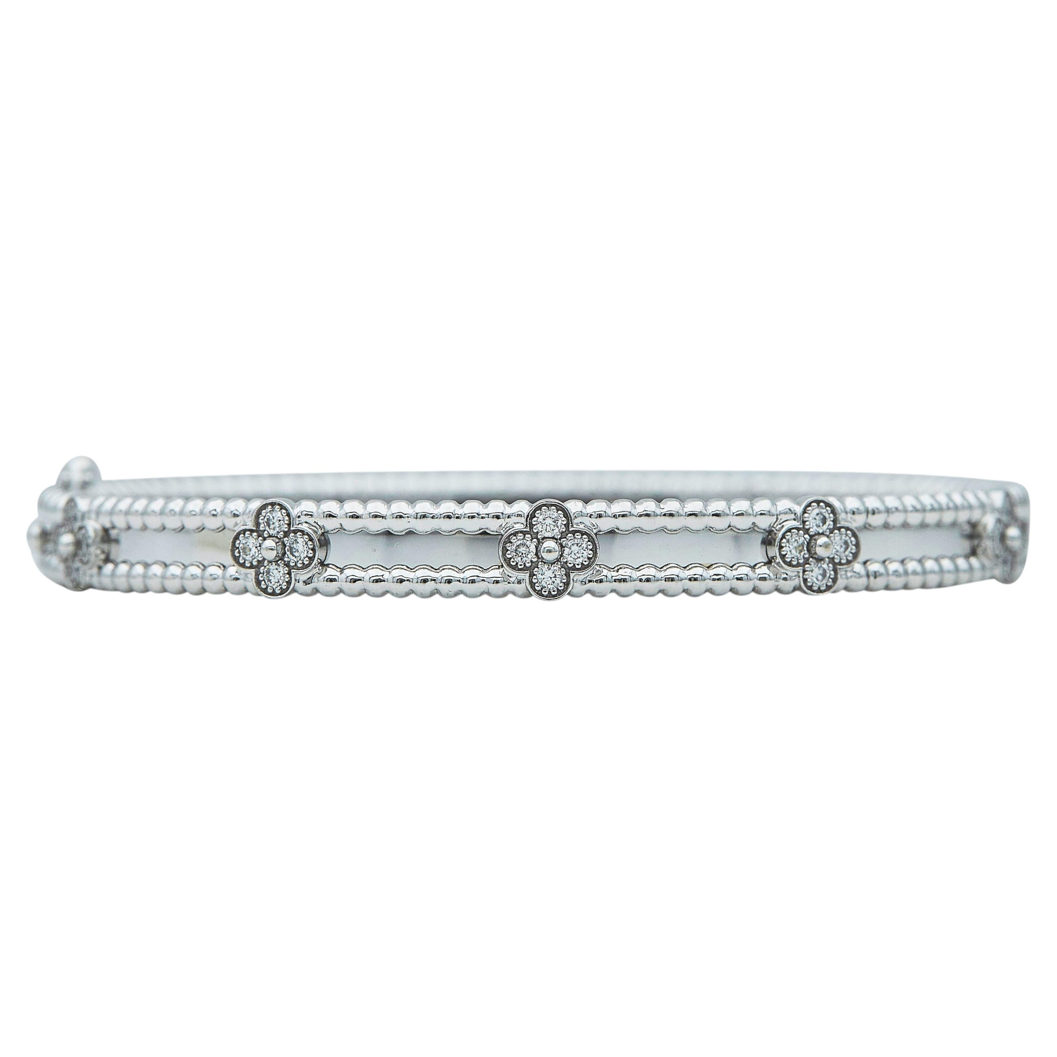 Van Cleef and Arpels Perlee Signature Gold Bangle Bracelet at 1stDibs ...