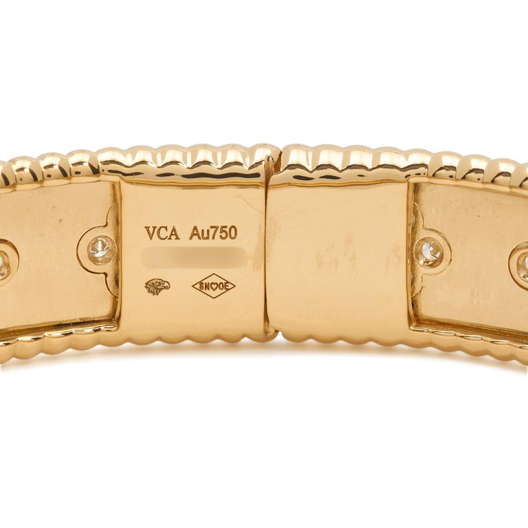 Van Cleef and Arpels Perlée Clovers Gold and Diamond Bangle at 1stDibs