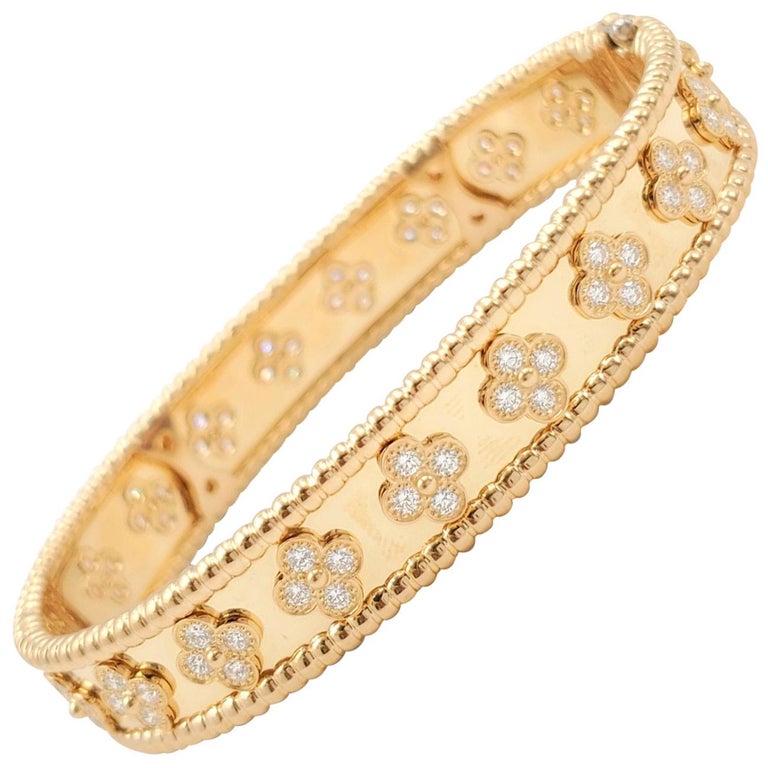 Van Cleef and Arpels Perlée Clovers Yellow Gold and Diamond Bangle at ...