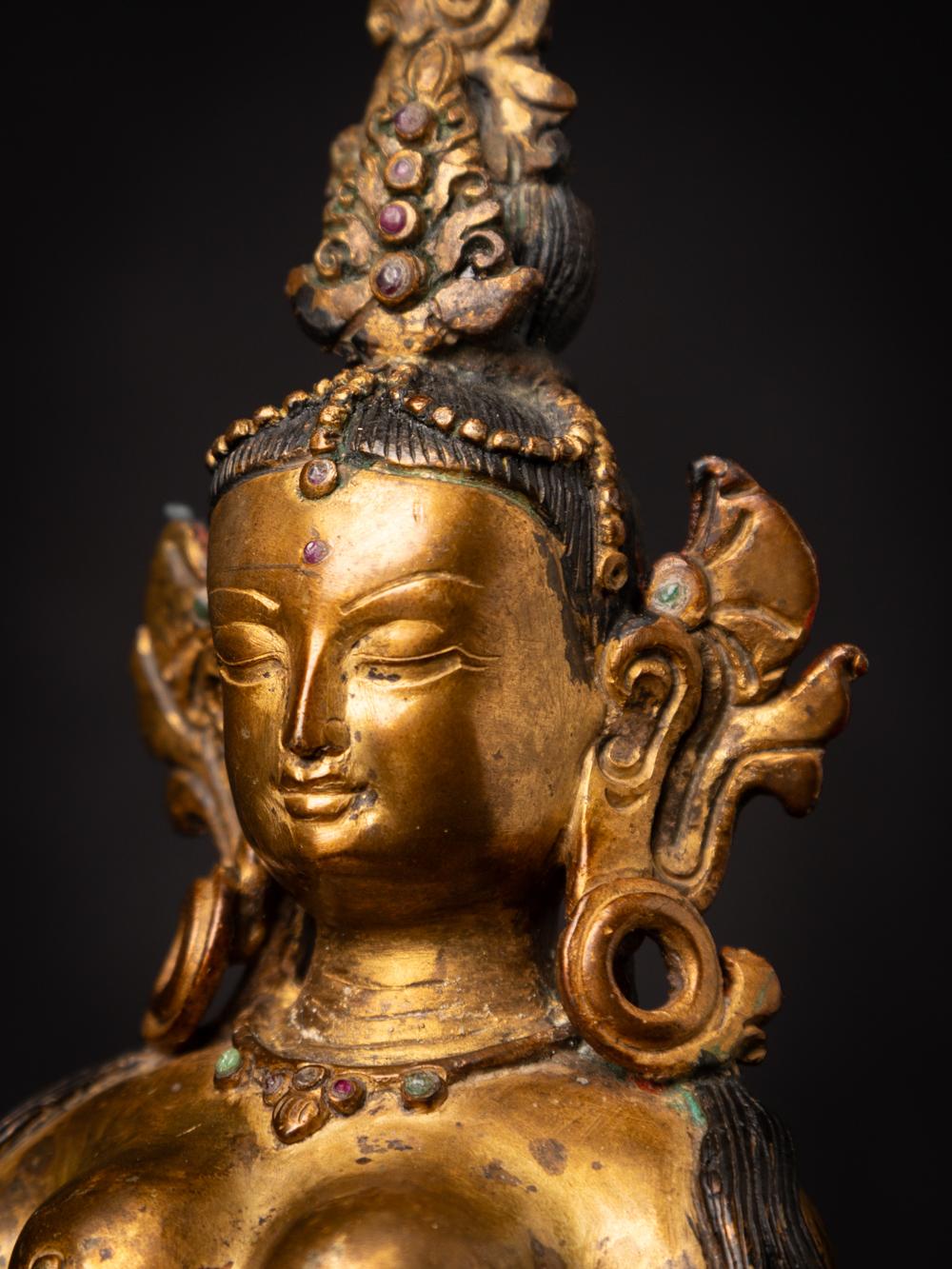 Varada mudra Old bronze Nepali Basundhara statue from Nepal at 1stDibs