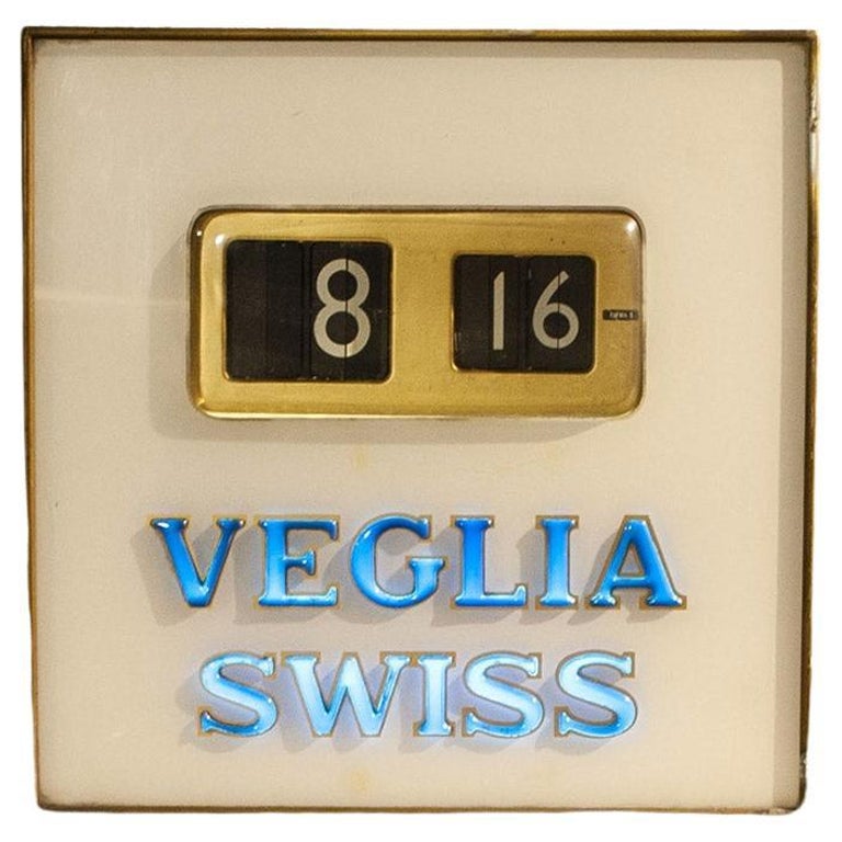 Veglia Swiss advertising paddle clock 60’s. For Sale at 1stDibs
