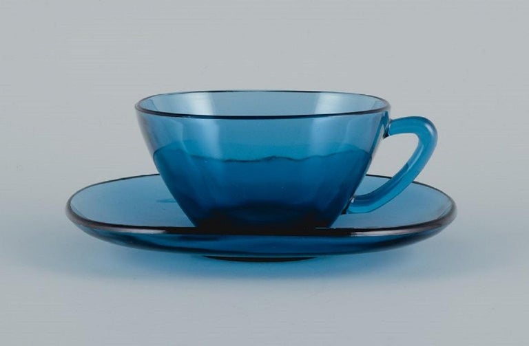 Vereco, France, a Set of Four Teacups and Matching Saucers in Blue ...