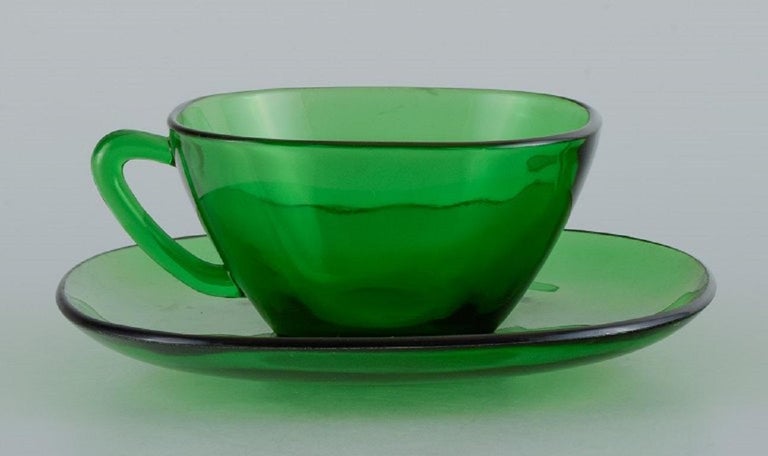 Vereco, France, a set of twelve teacups with matching saucers and a ...